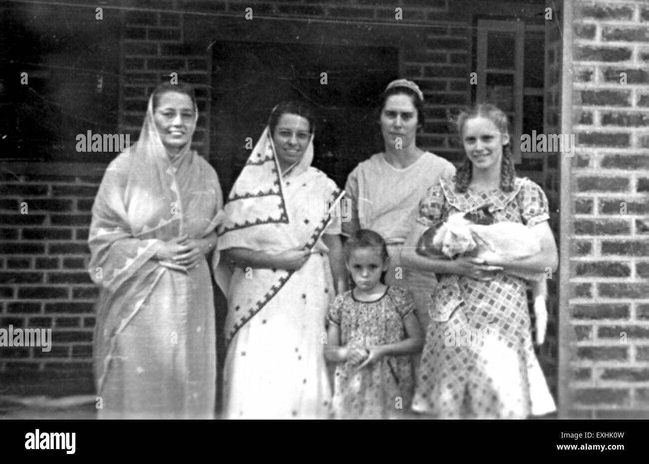 This undated photograph shows a group of missionary women in India ...