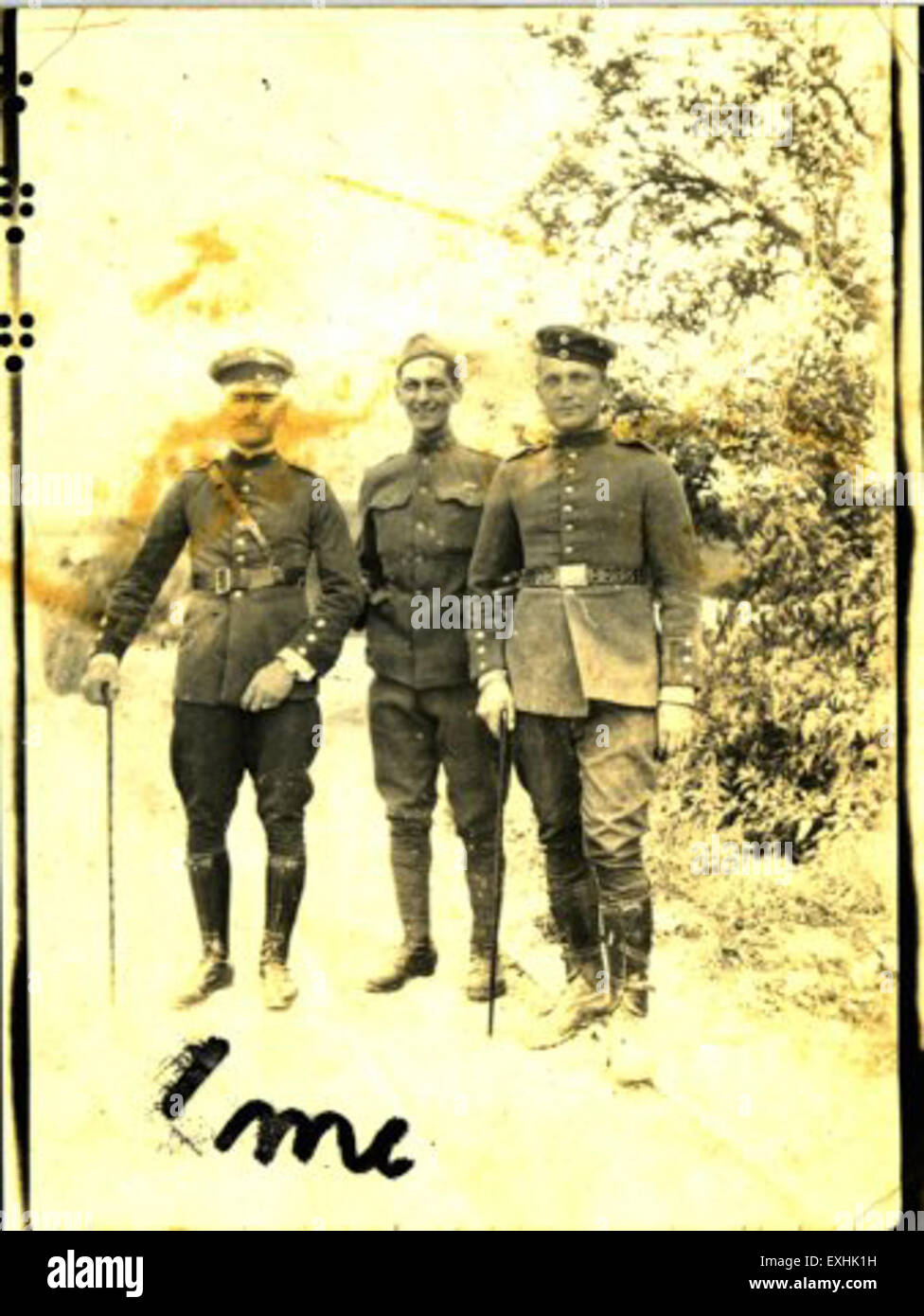 A historical photograph of German prisoner uniforms modeled by George ...