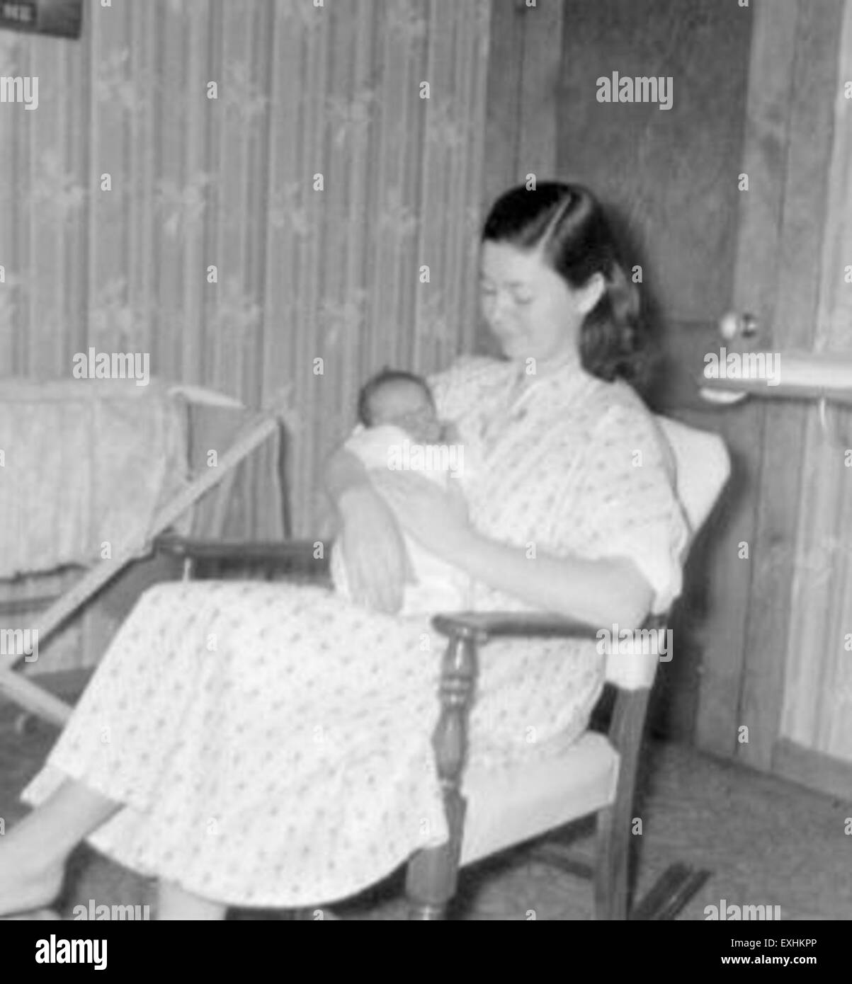 A newborn baby rests in the arms of its mother in Culp, Arkansas. The ...