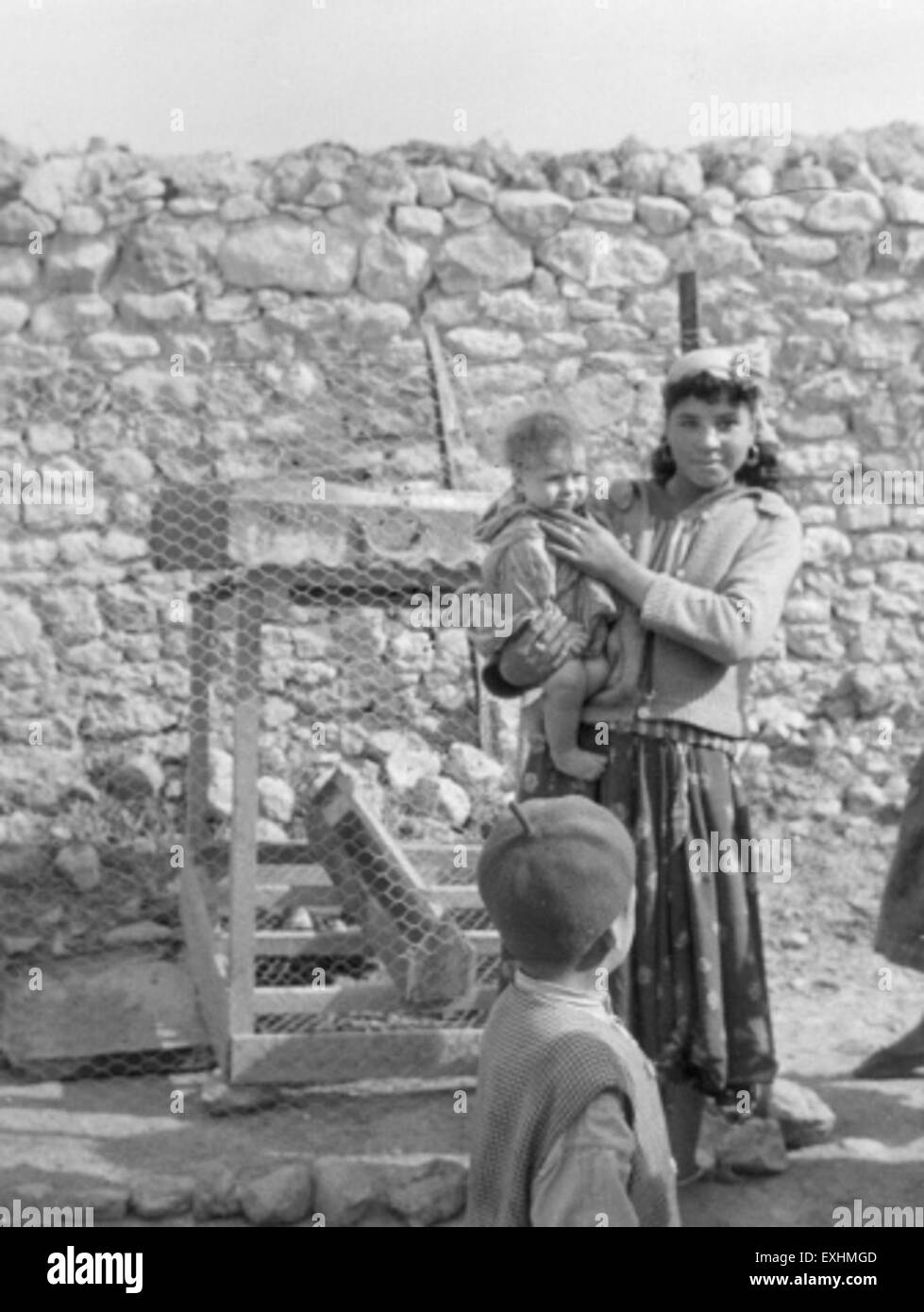 This photograph or painting depicts a group of Algerian children ...