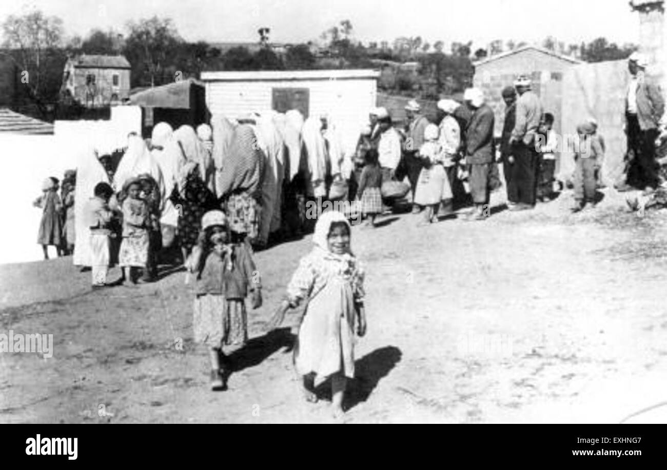 This image captures the relief distribution effort in Algeria, focusing ...