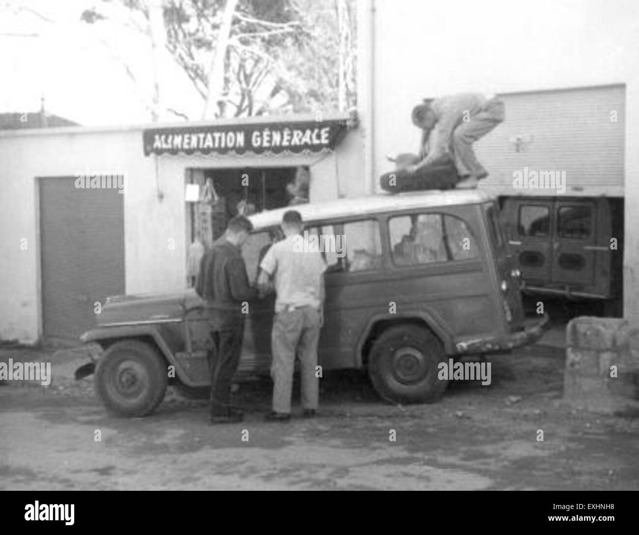 The image depicts workers returning to their work sites in Algeria ...
