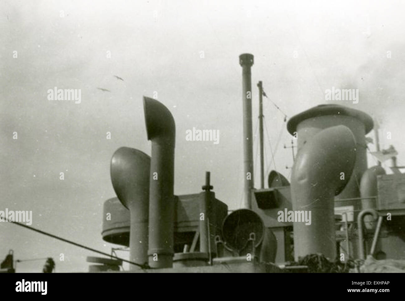 This maritime scene captures the dynamic environment of ships at sea ...