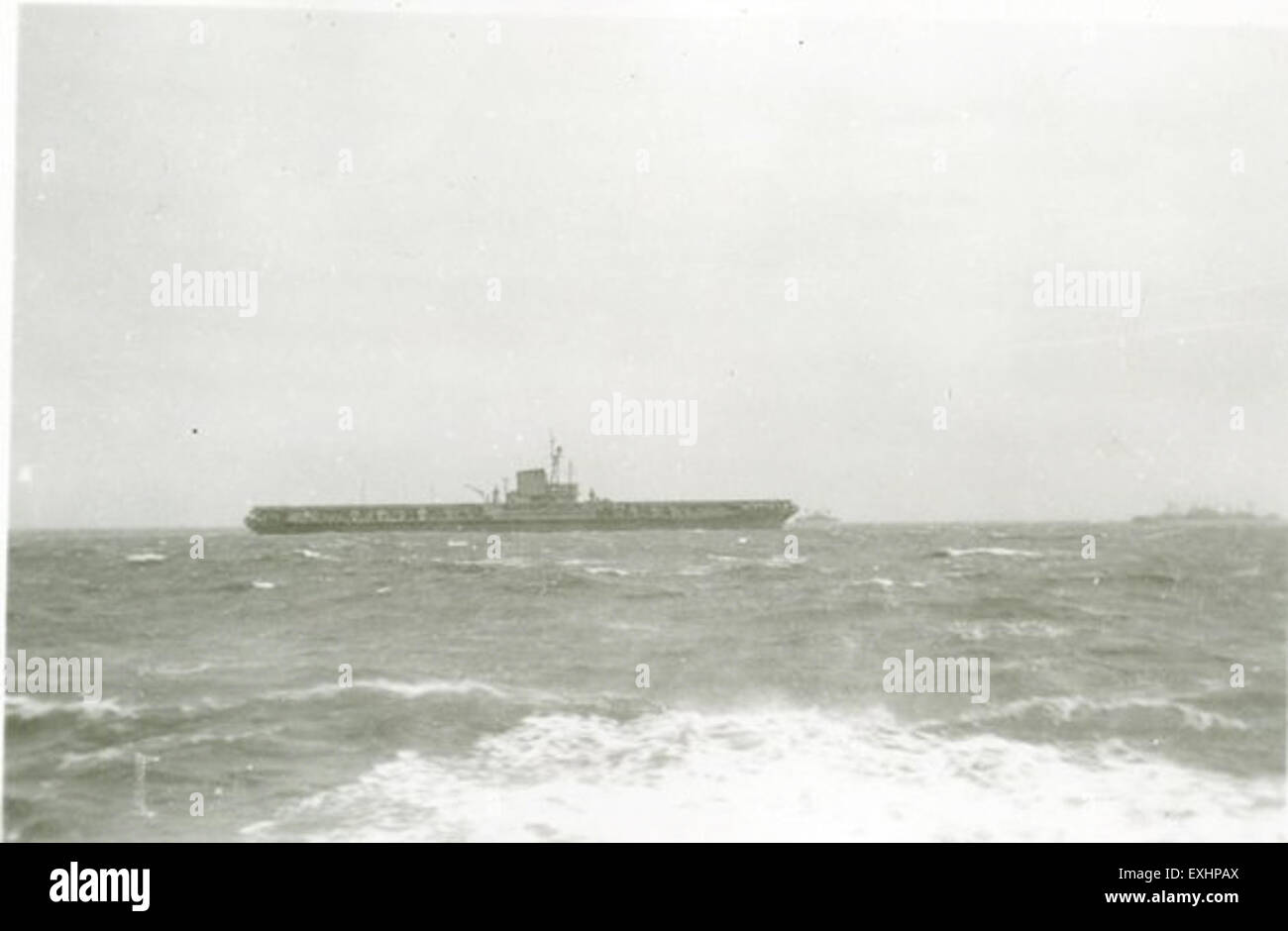 A seascape featuring ships on the sea, capturing the dynamic movement ...