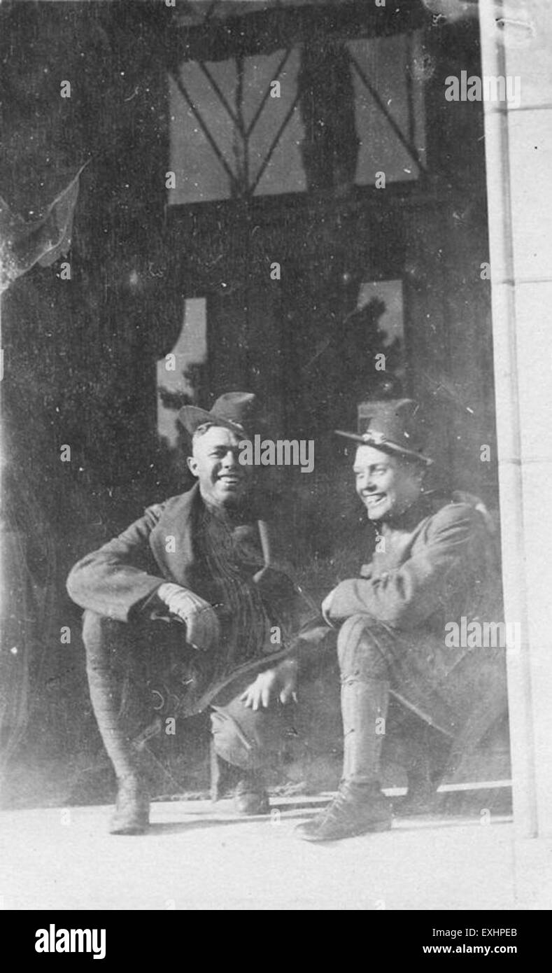 A photograph capturing soldiers taking a break, possibly during a ...