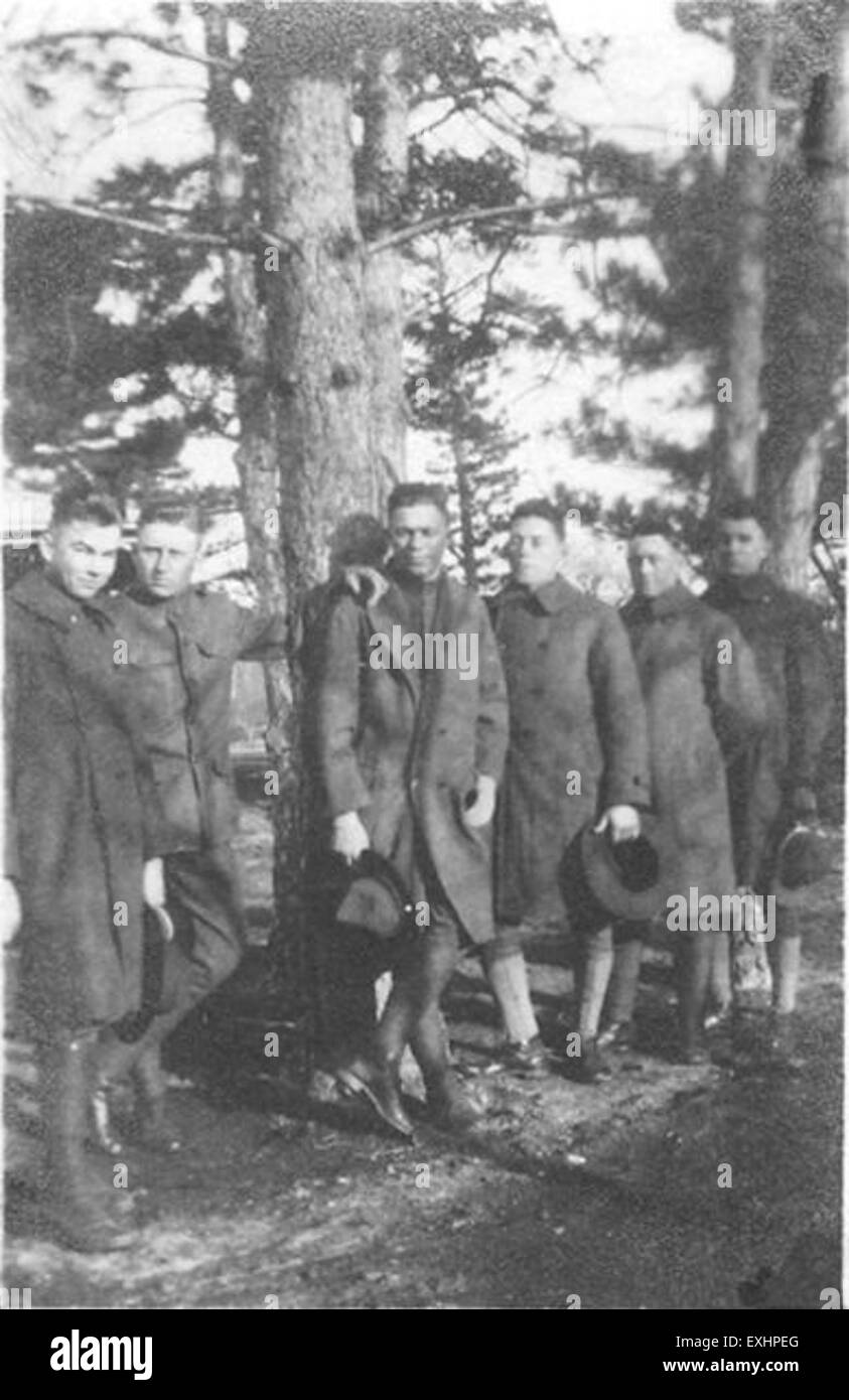 The photograph captures soldiers in a moment of camaraderie, showcasing ...