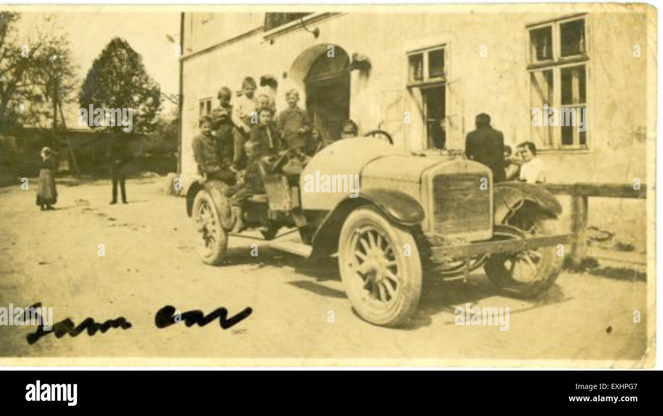 This early 20th-century photograph depicts a George Springer automobile ...