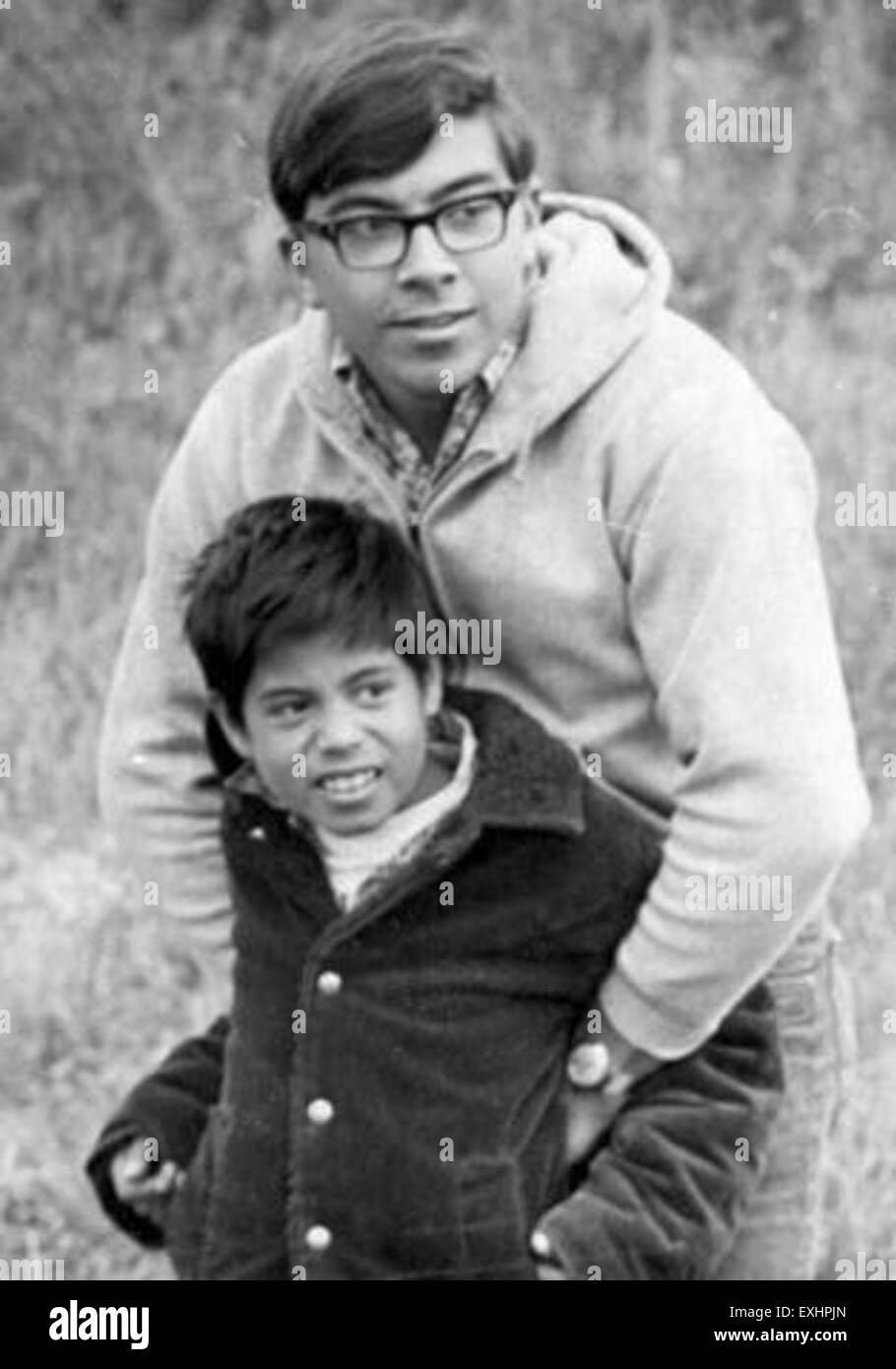 This image features Steve Ramer with one of his boys, capturing a ...