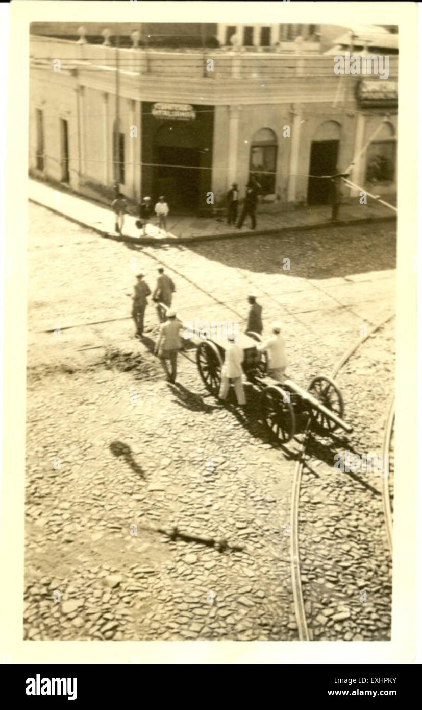 This historical photograph captures a street scene in Asuncion ...