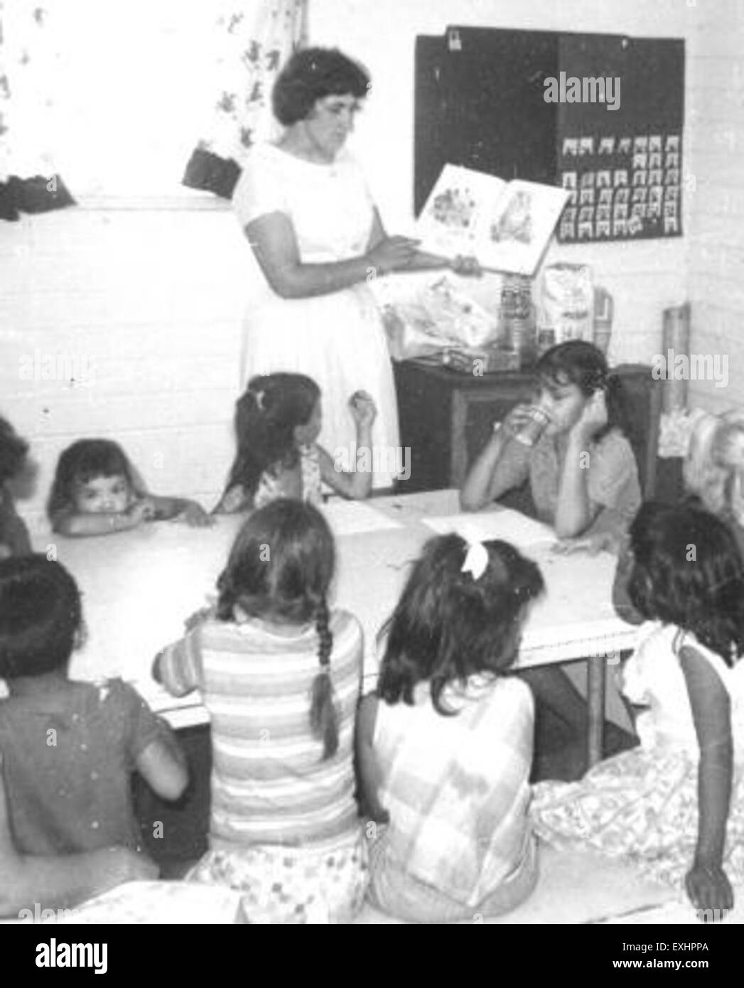 This photograph captures a Mennonite volunteer, Charlene Gerber ...