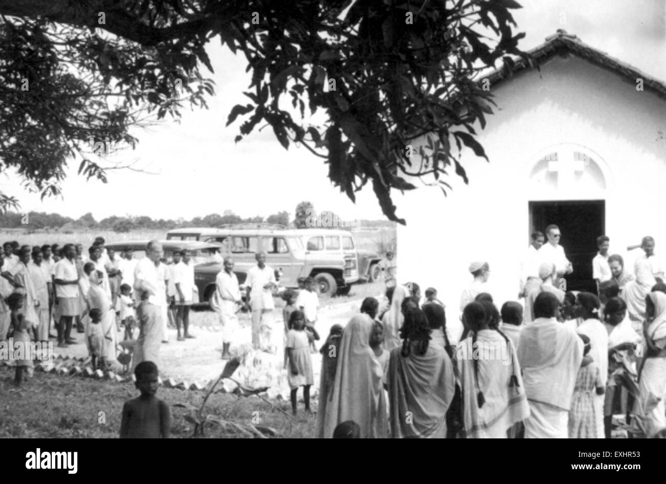 A historical photo documenting the dedication of Tati Church in India ...