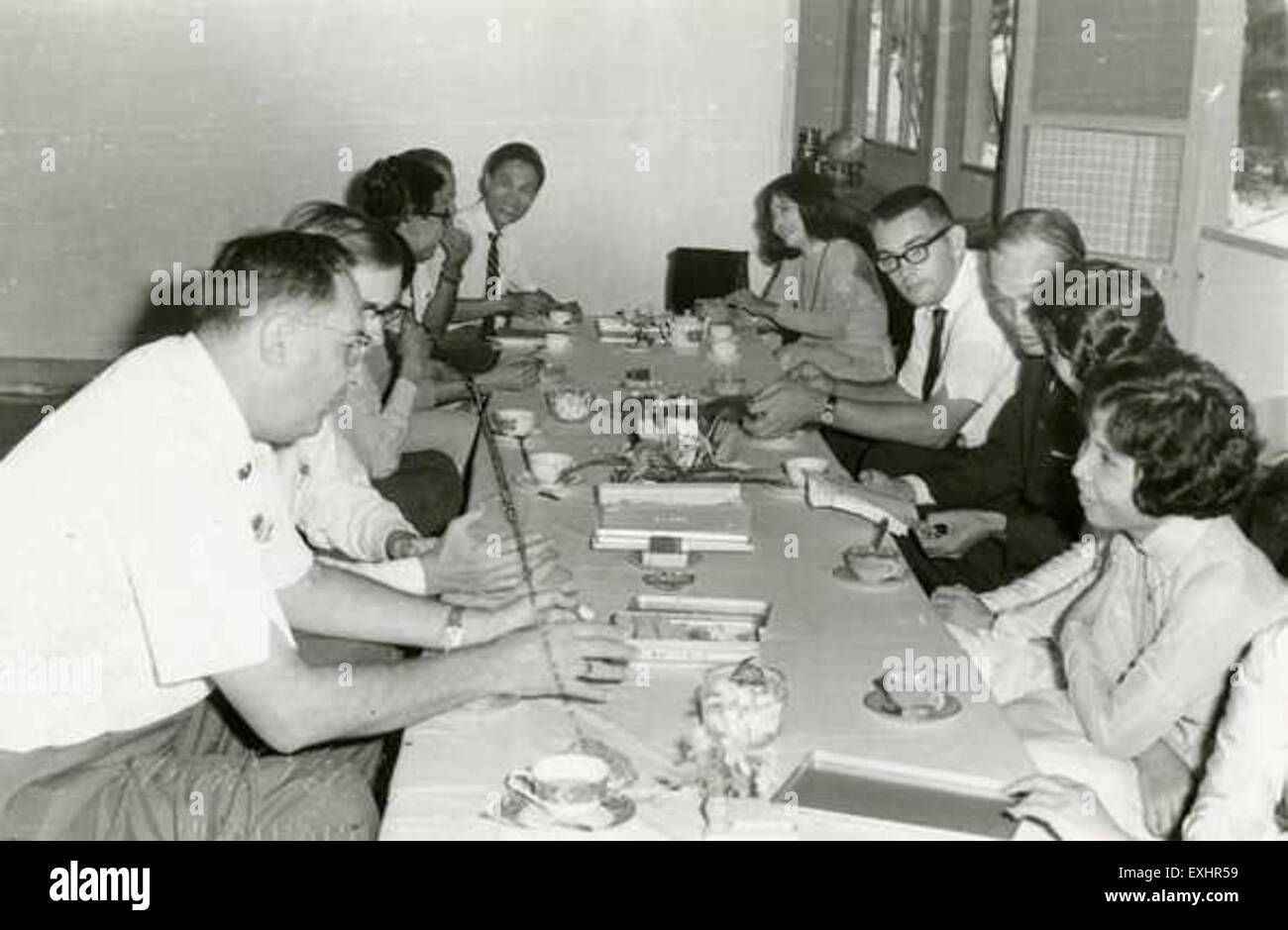 This image portrays a group of children enjoying a tea break at school ...