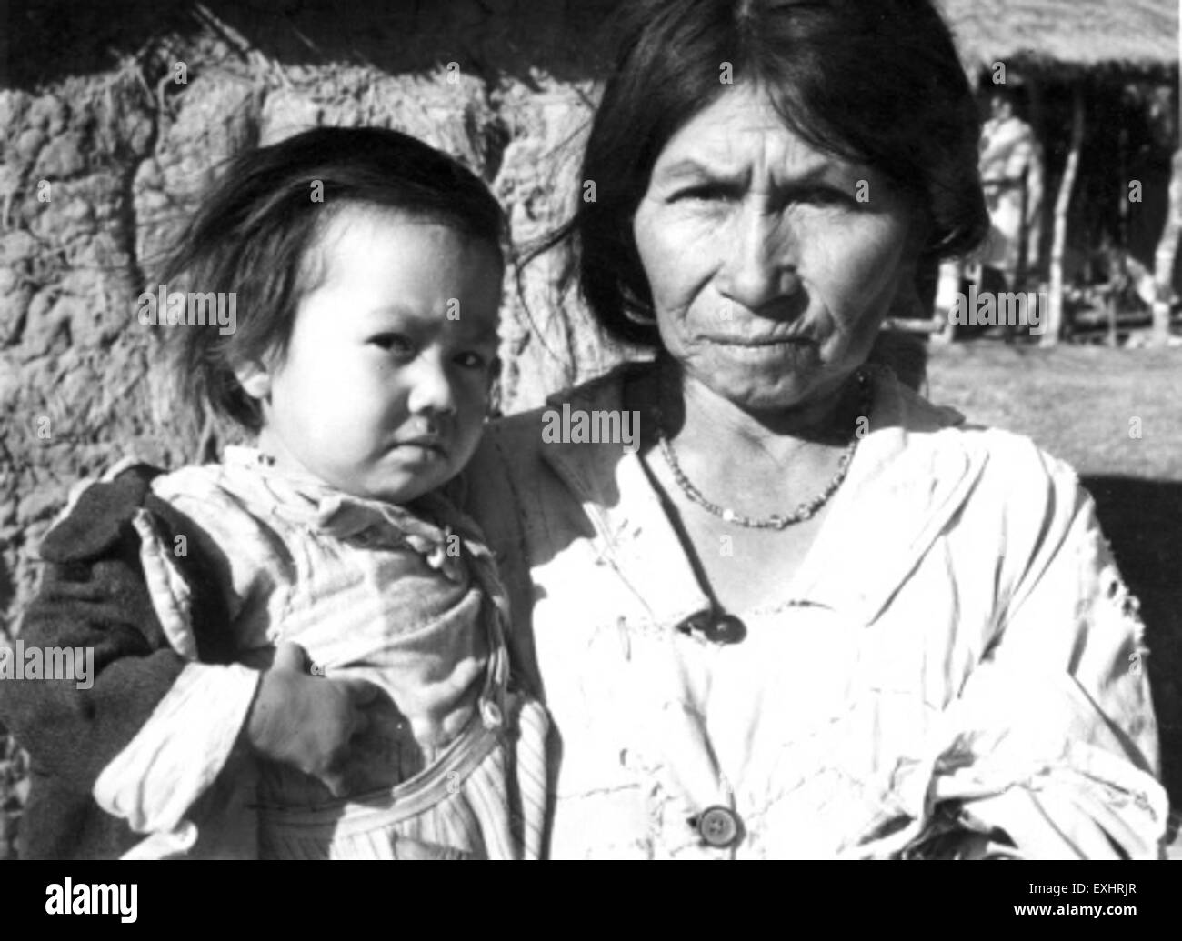 A photograph depicting a Toba mother and child from the Chaco region of ...