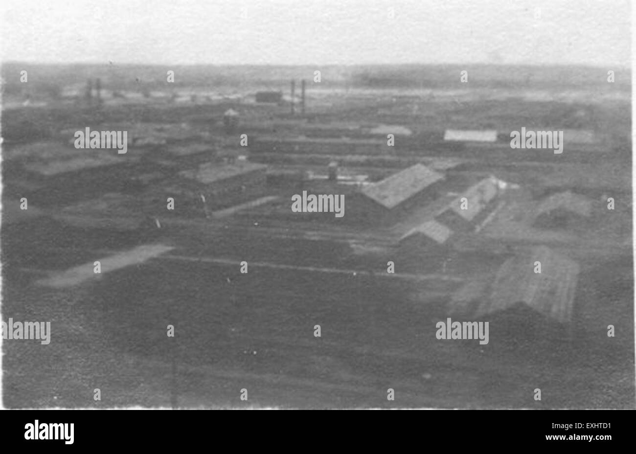 This historical image shows a military camp, capturing the setting and ...
