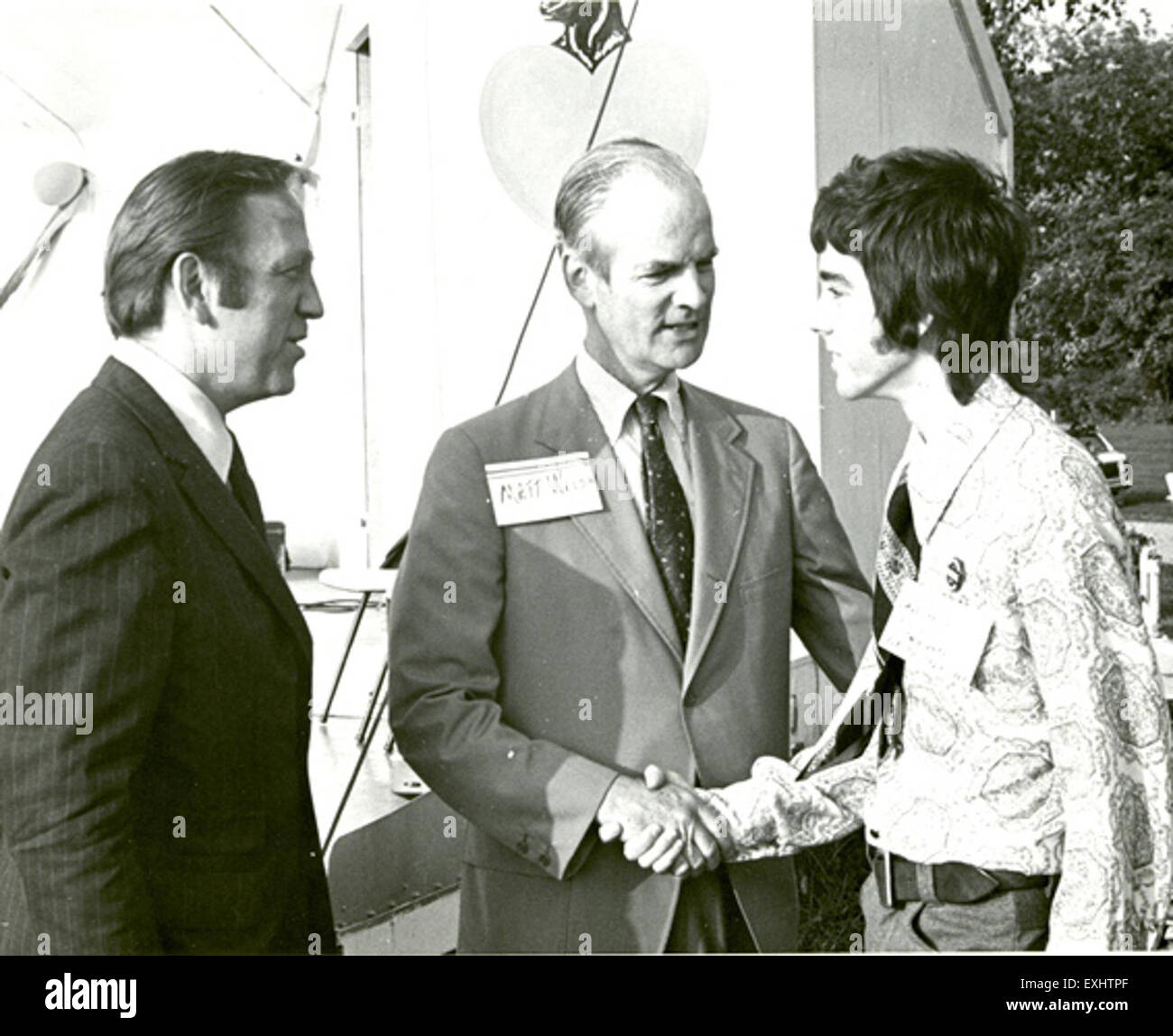 An image depicting the handshake between Welsh and Perkins, two ...