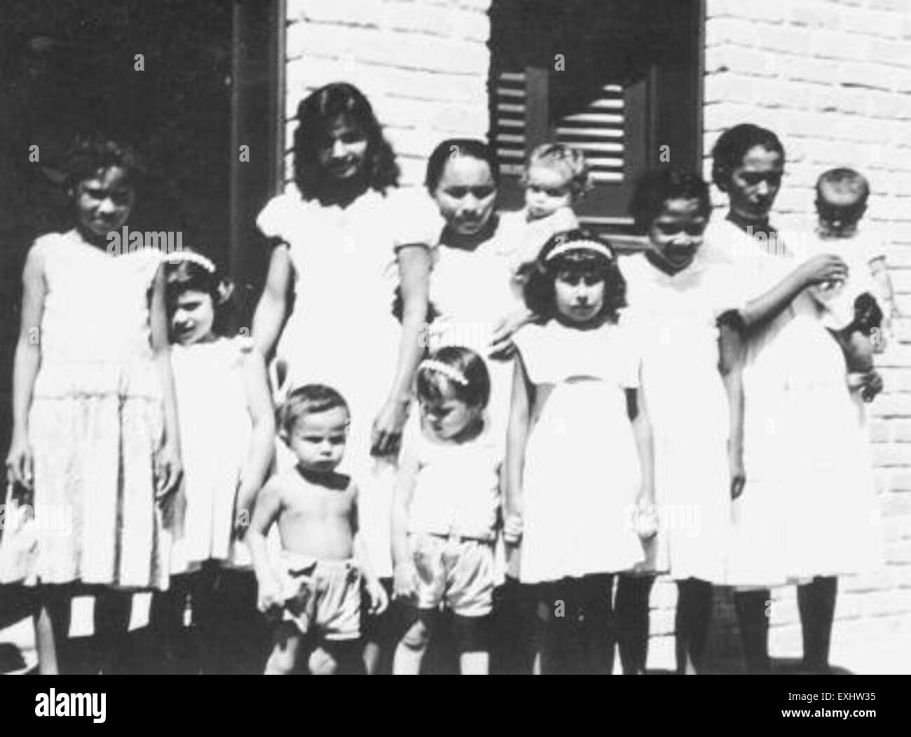 This photograph captures women and children from the Mennonite ...