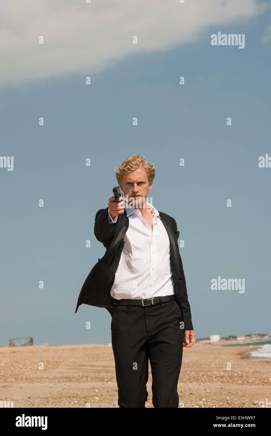 Man aiming gun camera hi-res stock photography and images - Alamy