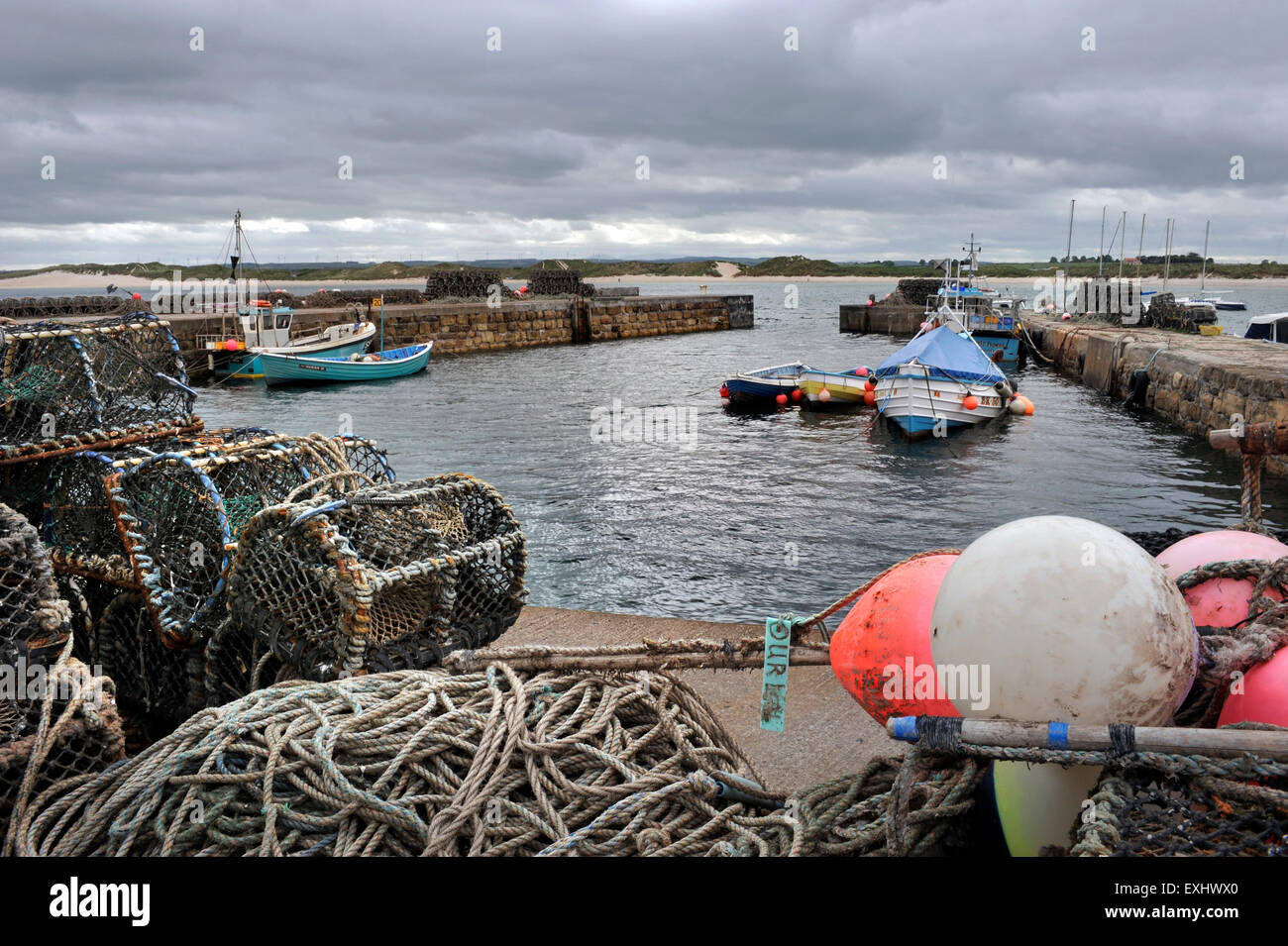 boats moored in beadnell harbour northumberland Stock Photo - Alamy
