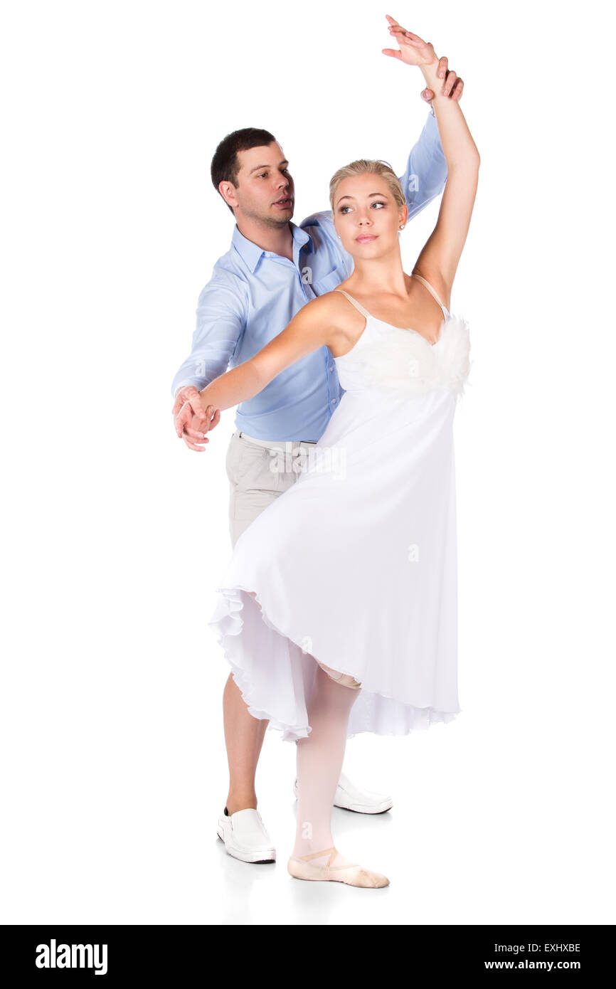 Beautiful female ballet dancer and her instructor isolated on a white ...