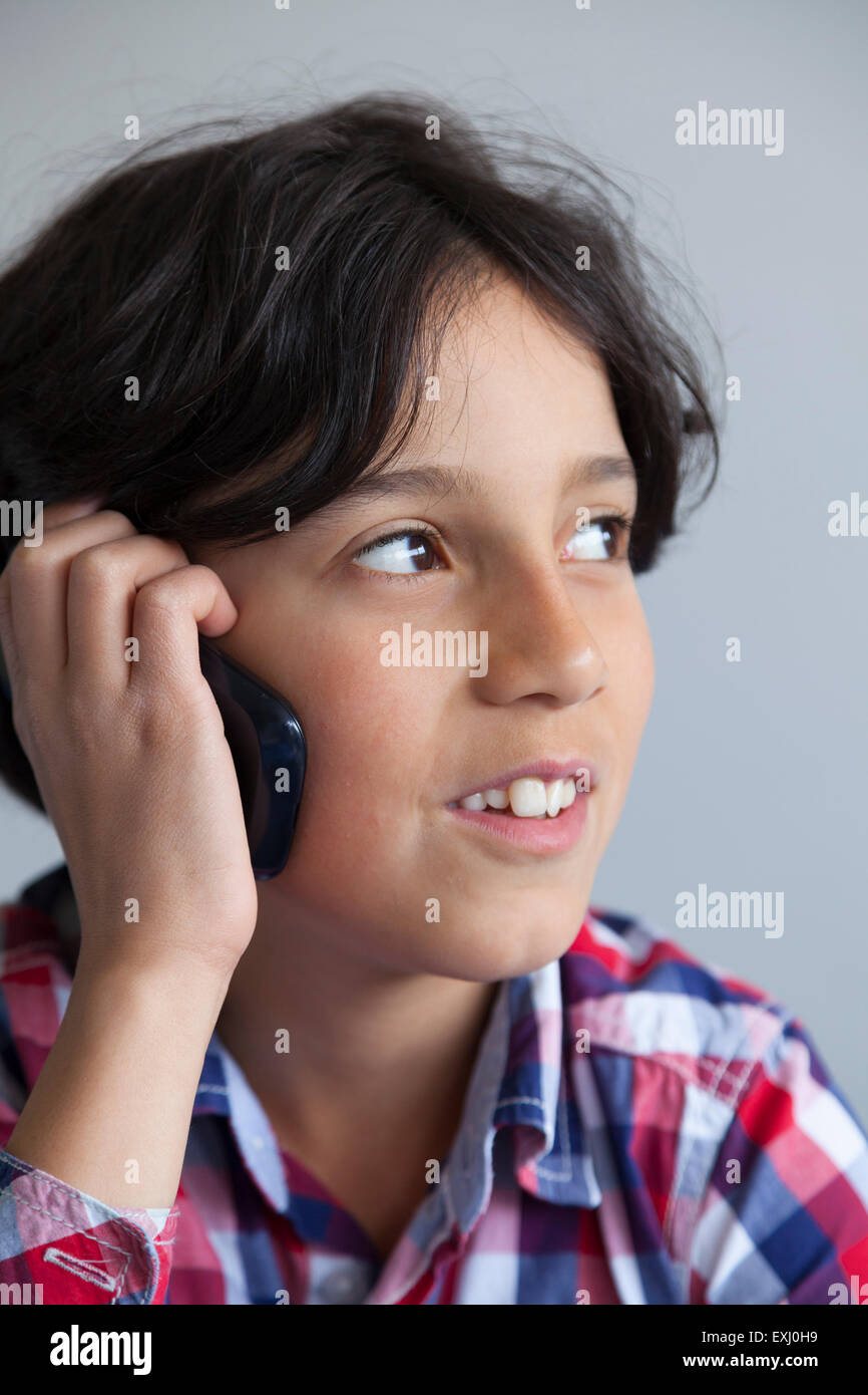 Teen boy phone hi-res stock photography and images - Alamy