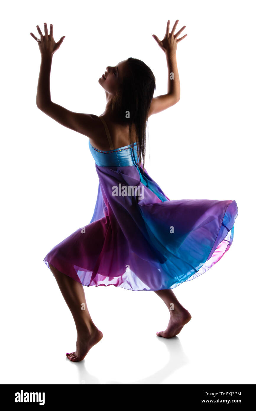 Silhouette of a beautiful female modern jazz contemporary style dancer ...