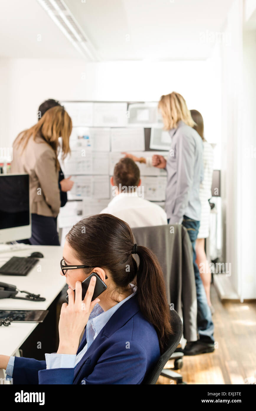 Working in a modern office Stock Photo - Alamy