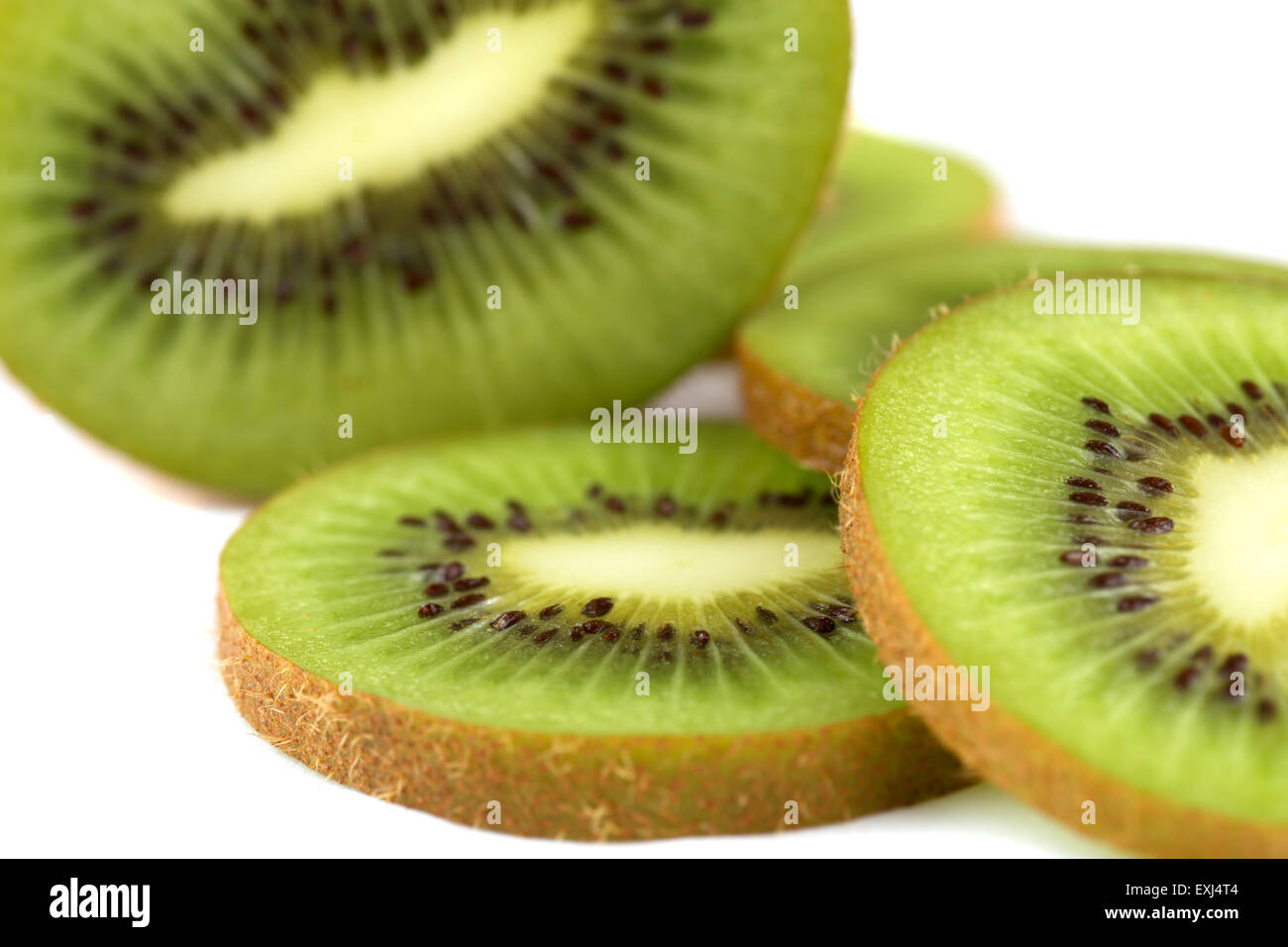 Kiwi fruit sliced segments on white background Stock Photo - Alamy