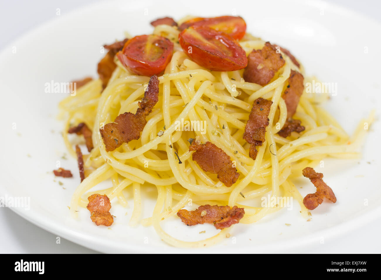 spaghetti pasta with Oregano bacon Stock Photo - Alamy