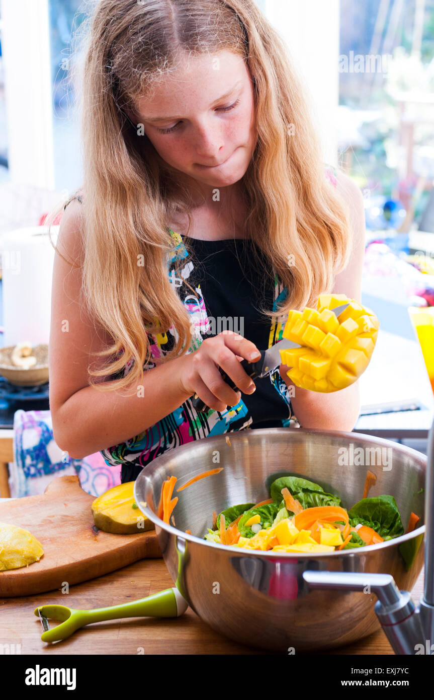 Child learning to cook and eat healthily Stock Photo - Alamy