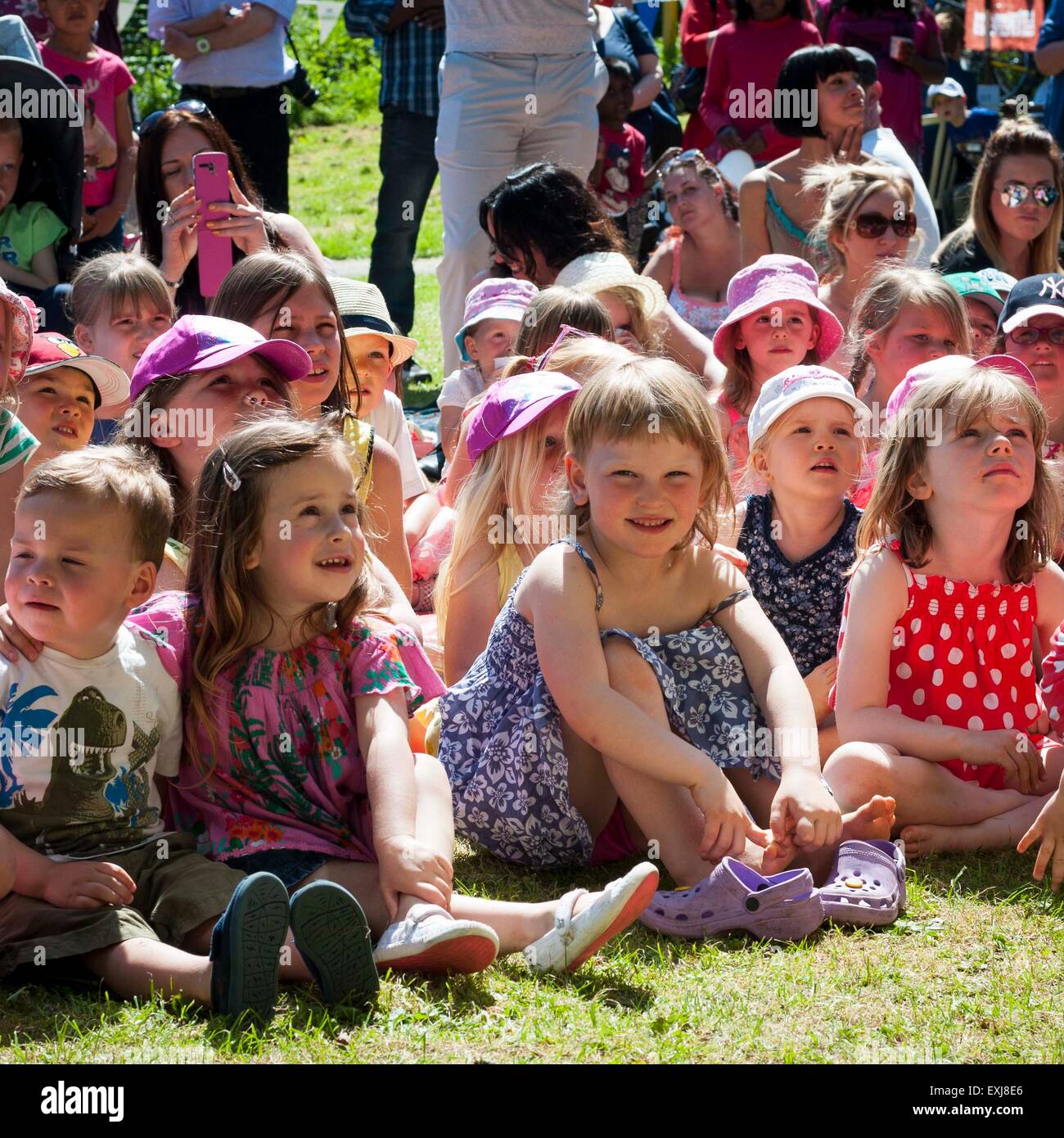 Audience Sitting On Grass High Resolution Stock Photography and Images ...