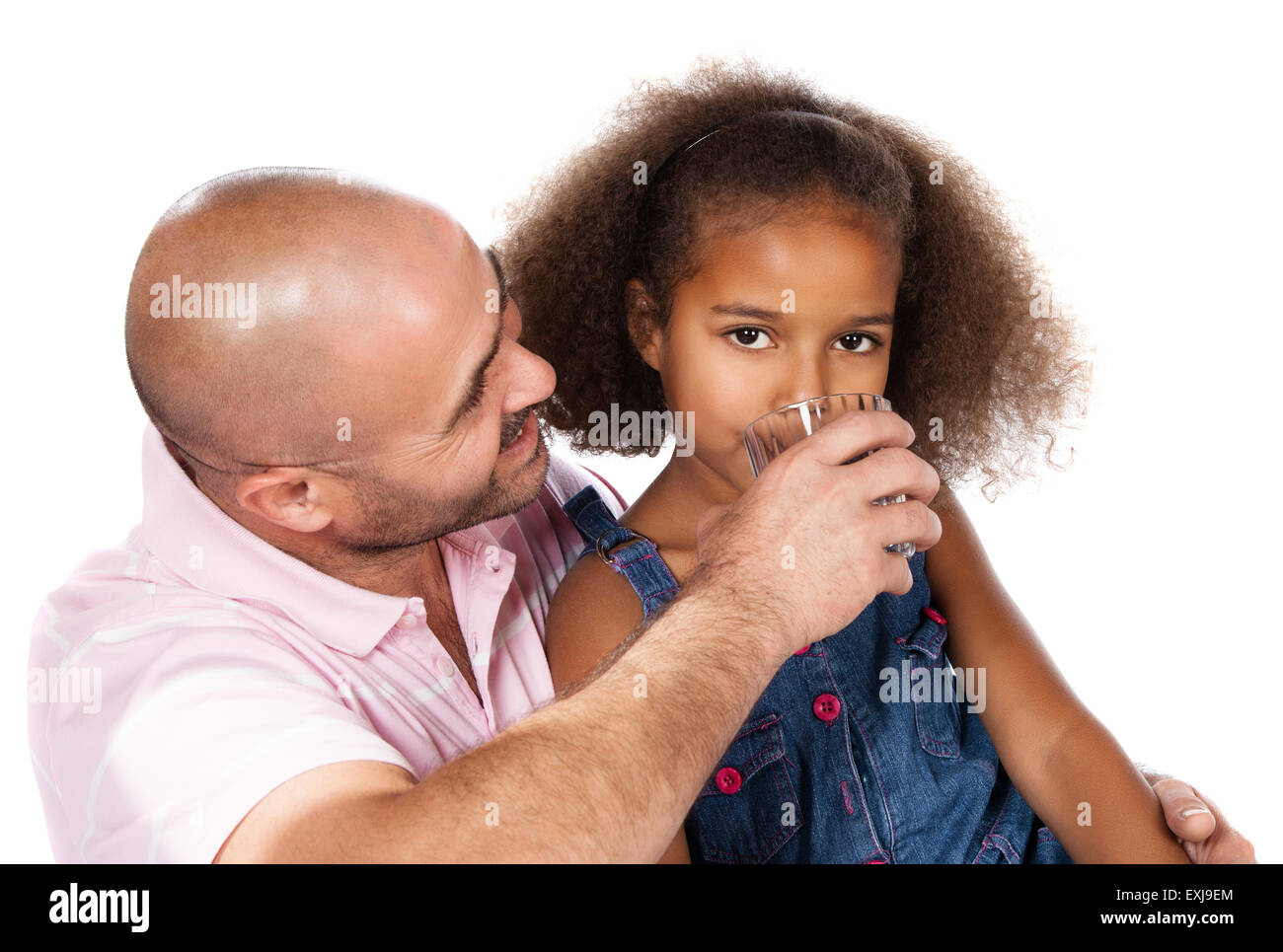 Adorable cute african child with afro hair wearing a denim dress. Her ...