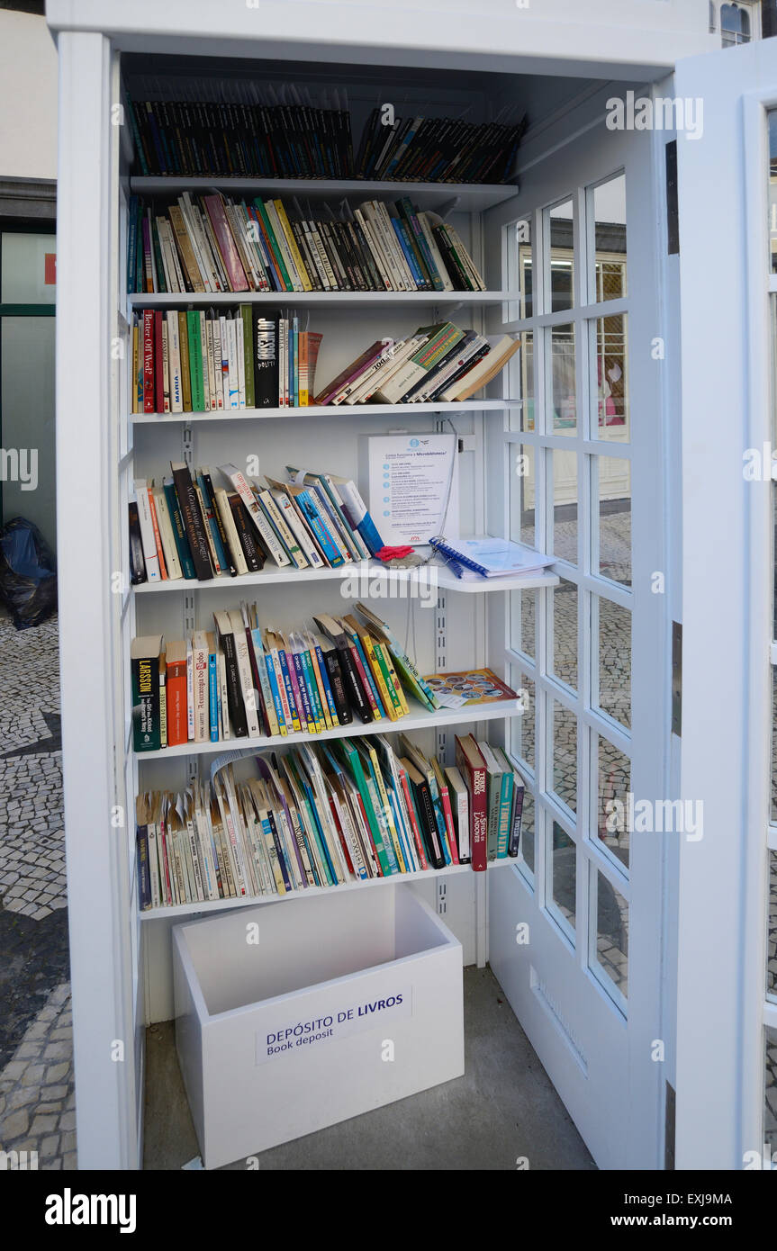 Public telephone box with library hi-res stock photography and images ...