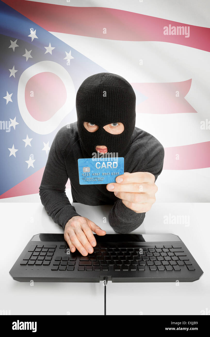 Hacker in black mask with USA state flag on background - Ohio Stock ...