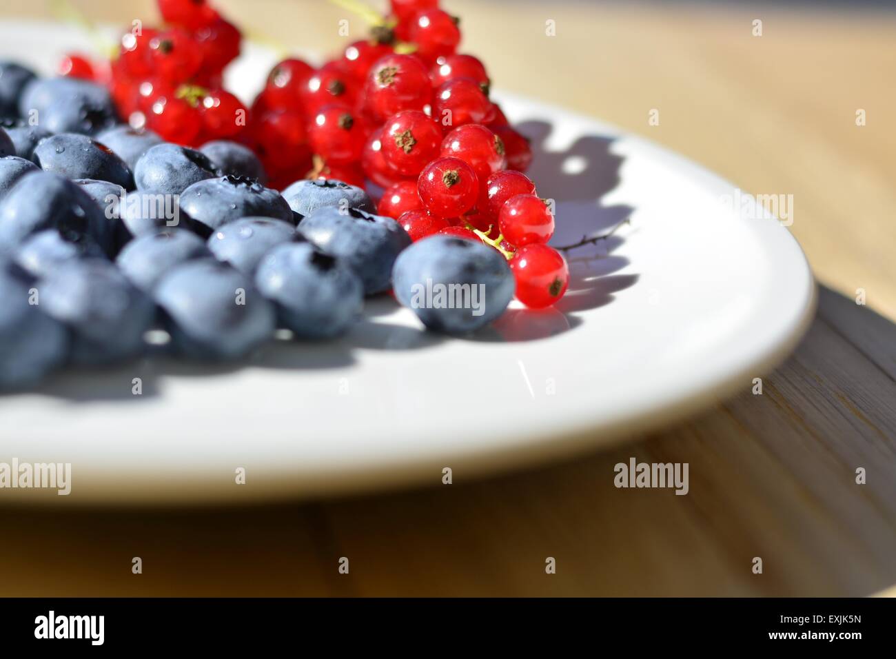 Blueberries and currants Stock Photo - Alamy