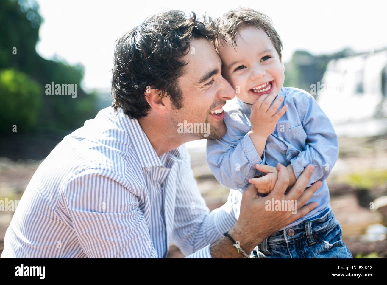 happy joyful father having fun with is child Stock Photo - Alamy