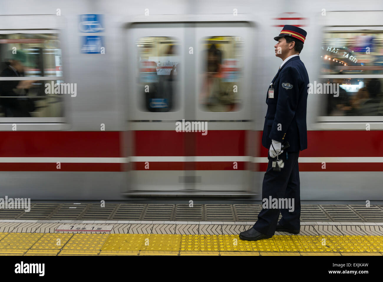 Guard Dispatching a Subway Train in Osaka, Japan Stock Photo - Alamy