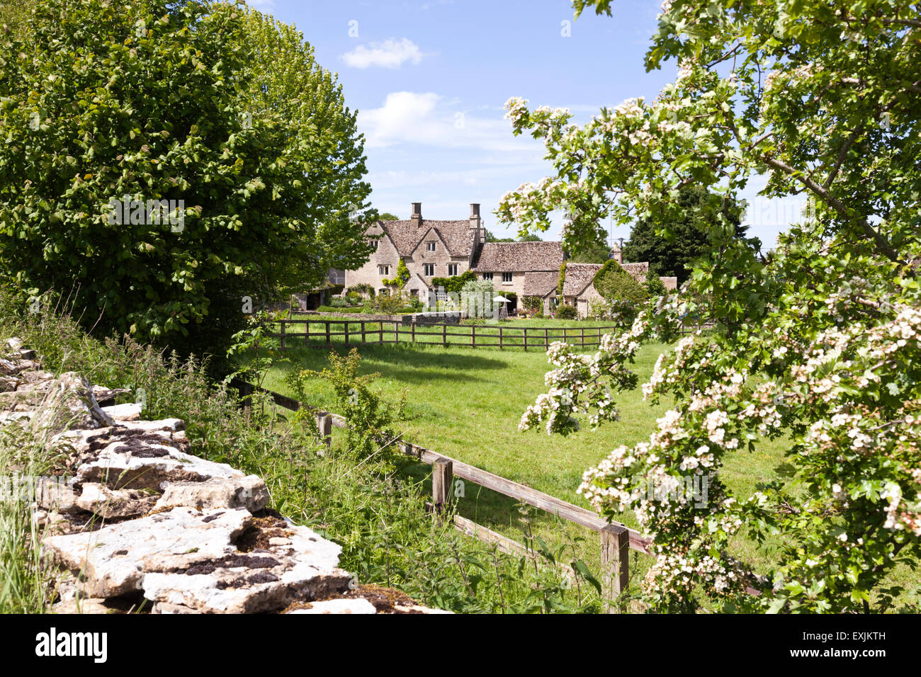 A traditional old farmhouse in the Cotswold village of Coln Rogers ...