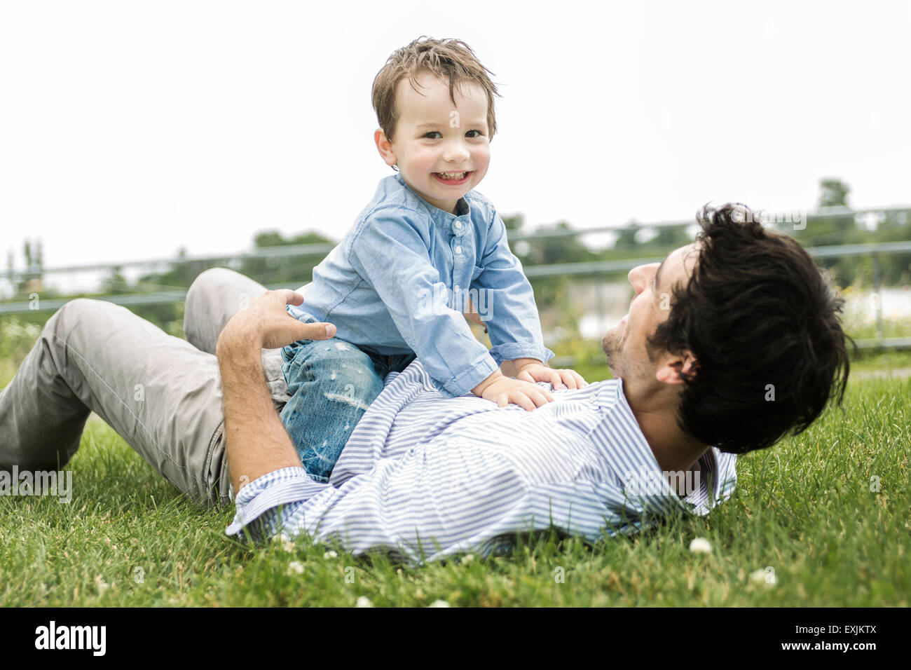 happy joyful father having fun with is child Stock Photo - Alamy
