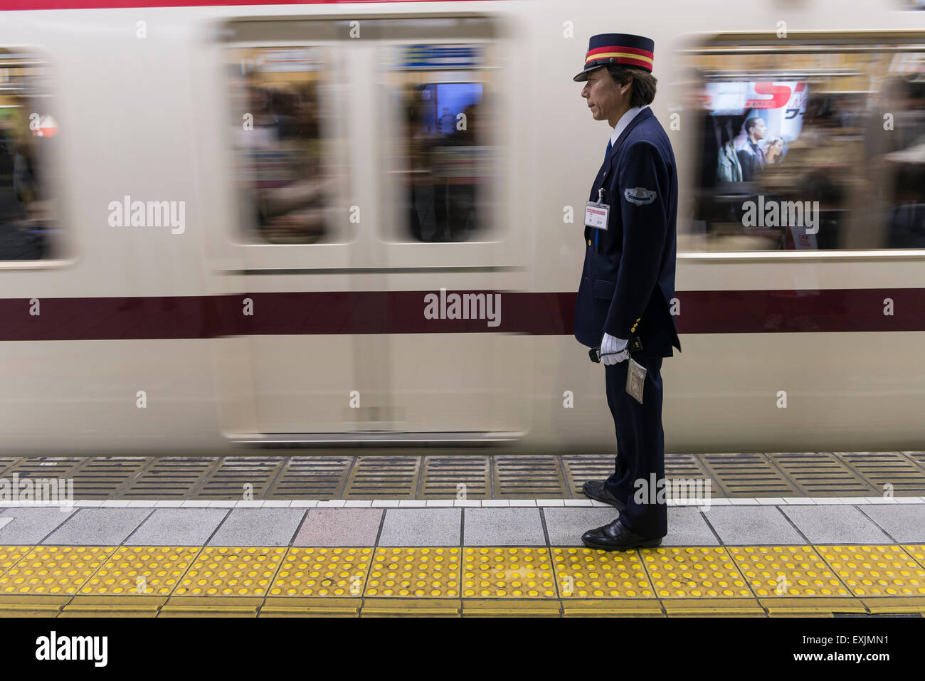 Guard Dispatching a Subway Train in Osaka, Japan Stock Photo - Alamy