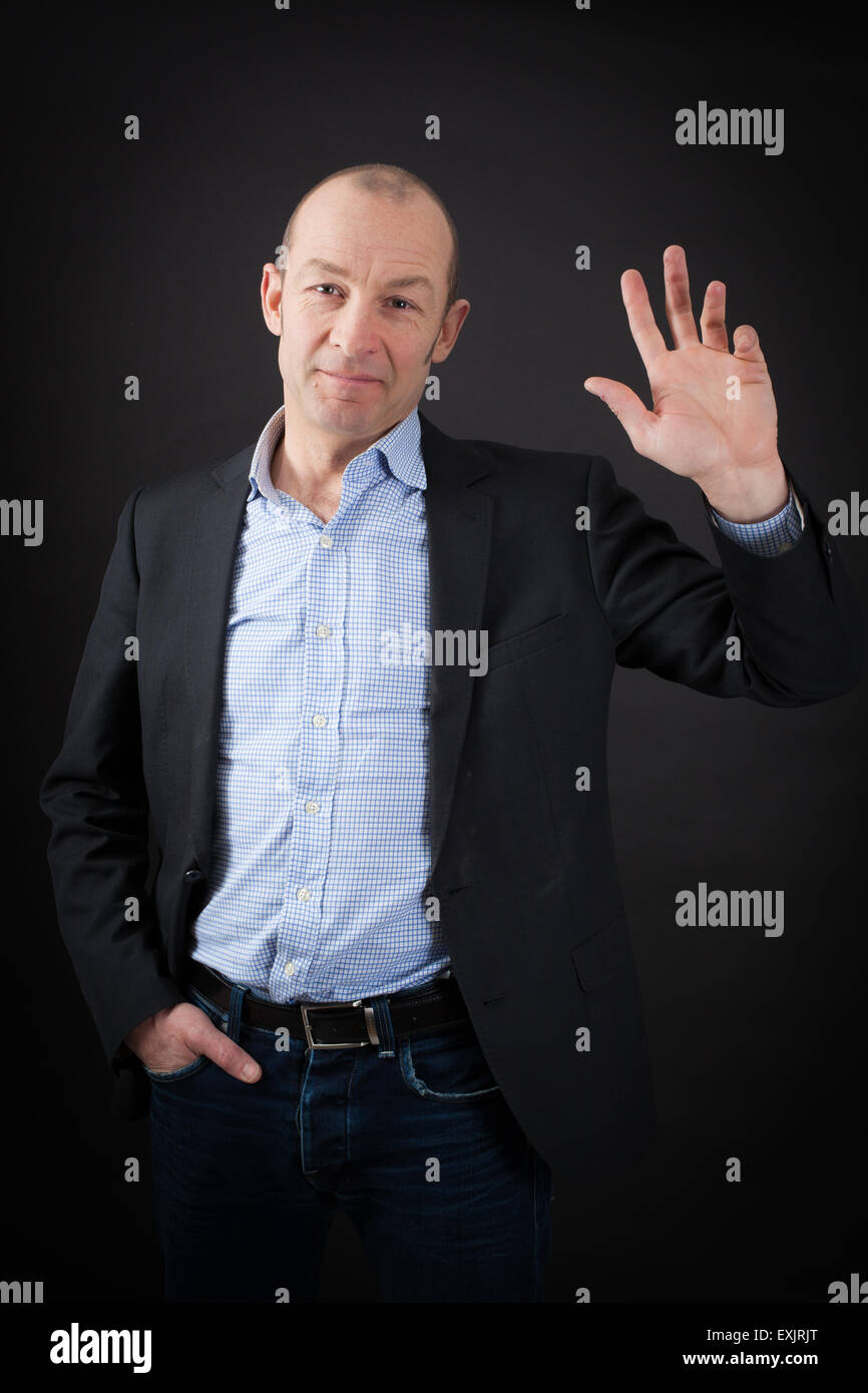 handsome man doing different expressions in different sets of clothes ...