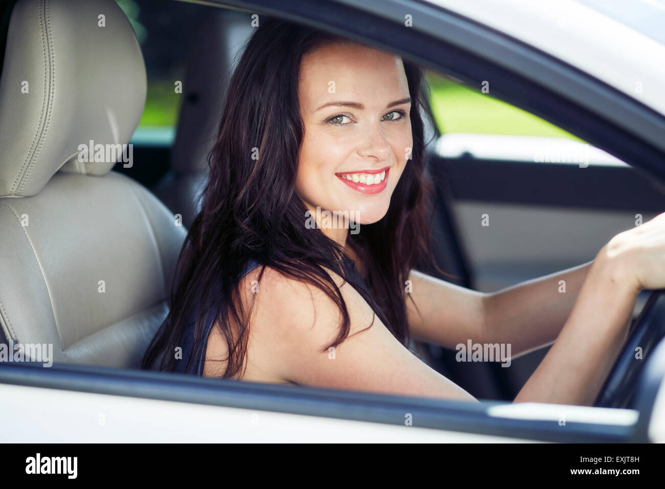 Beautiful woman driving Stock Photo - Alamy