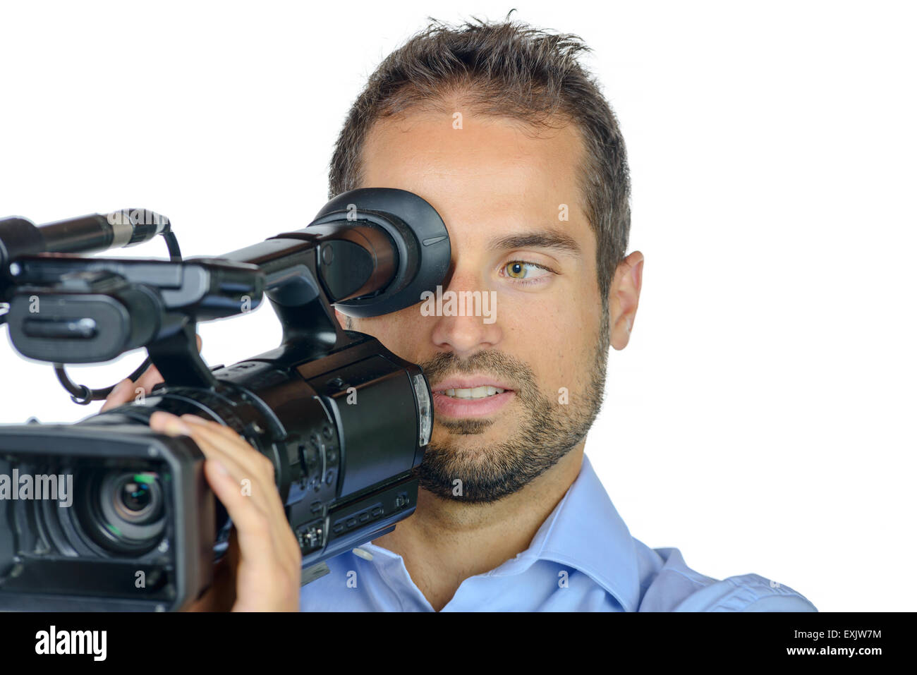 a young man with professional movie camera on white background Stock ...