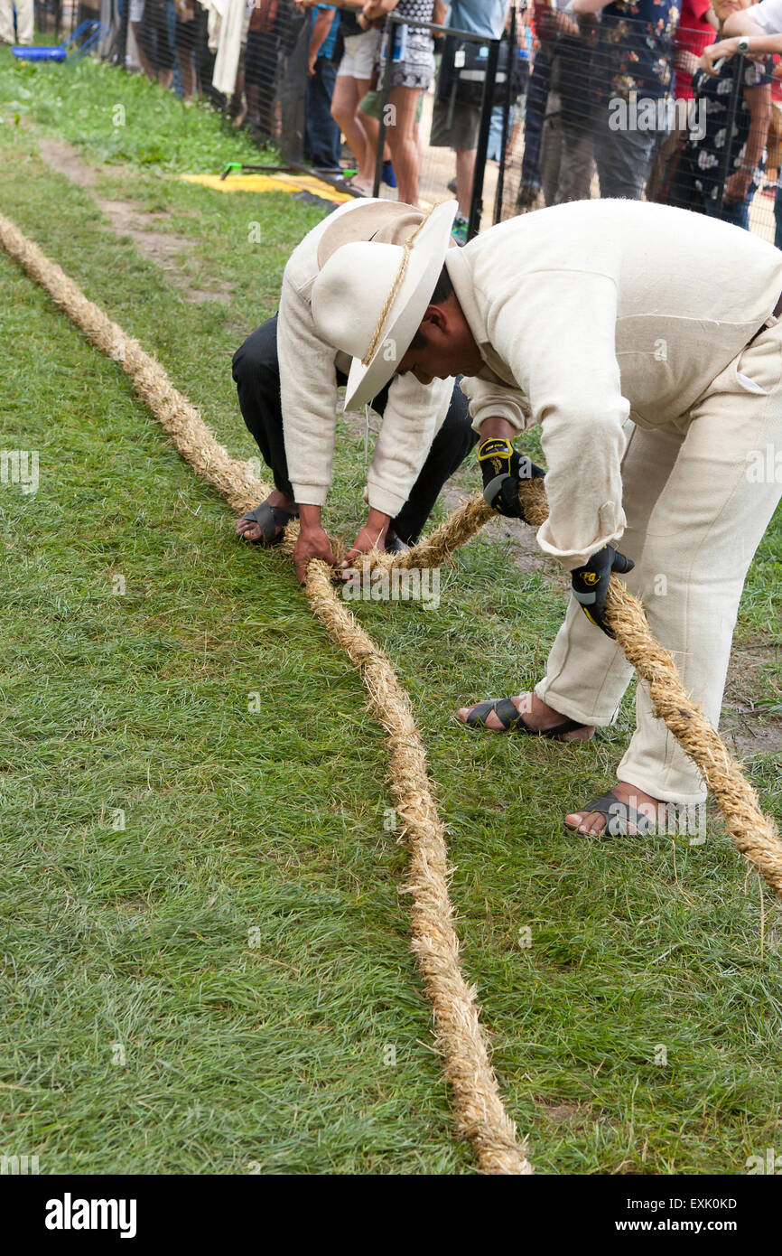 Native Peruvian men making rope Stock Photo - Alamy