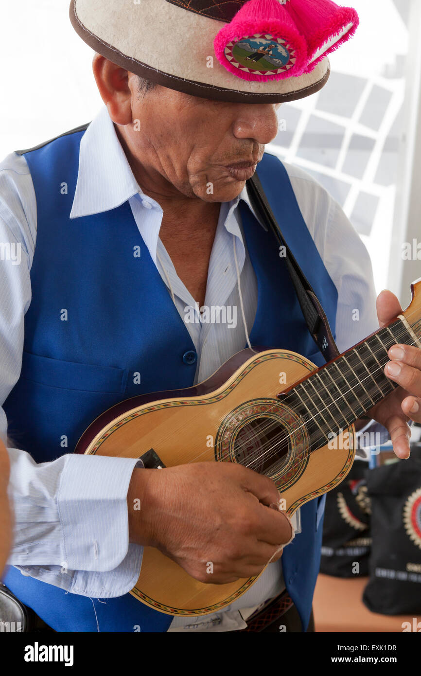 Peruvian man playing a charango Stock Photo - Alamy
