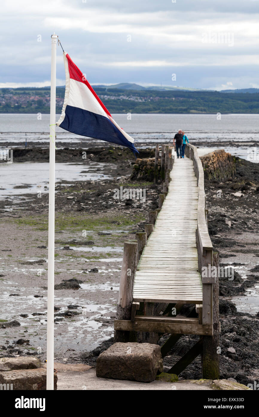 The pier (with medieval stone sections) beside the Firth of Forth, with ...