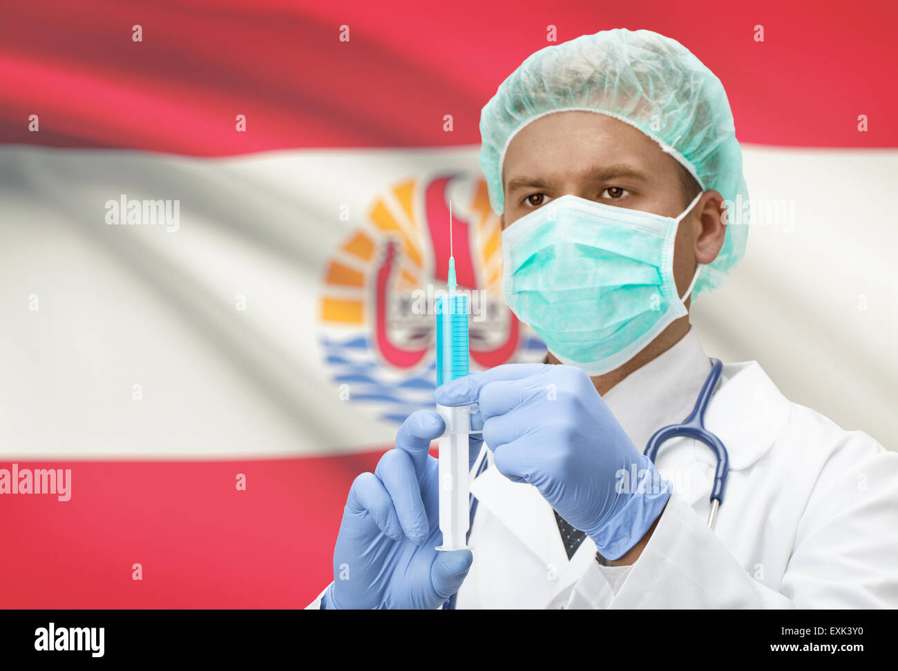 Doctor with syringe in hands and flag on background - French Polynesia ...