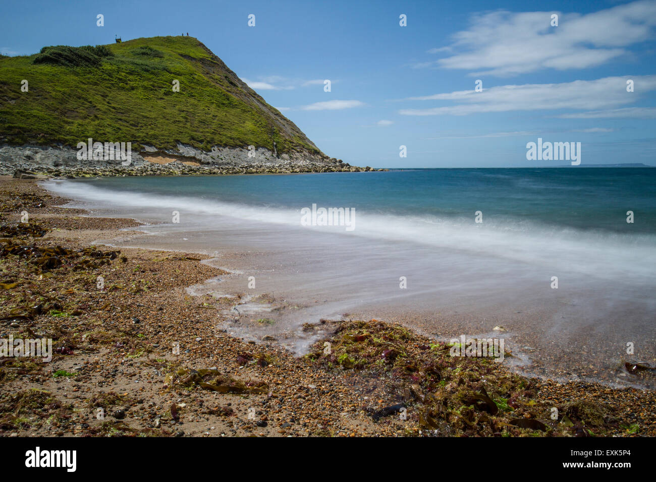 Water lapping onto rocks hi-res stock photography and images - Alamy