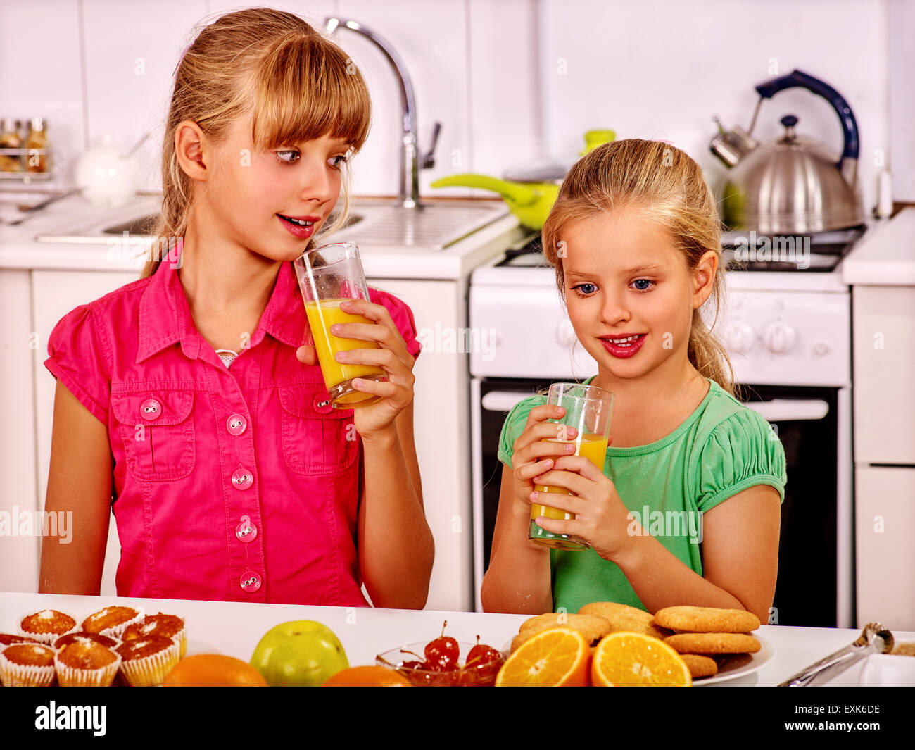 Children breakfast at kitchen Stock Photo - Alamy