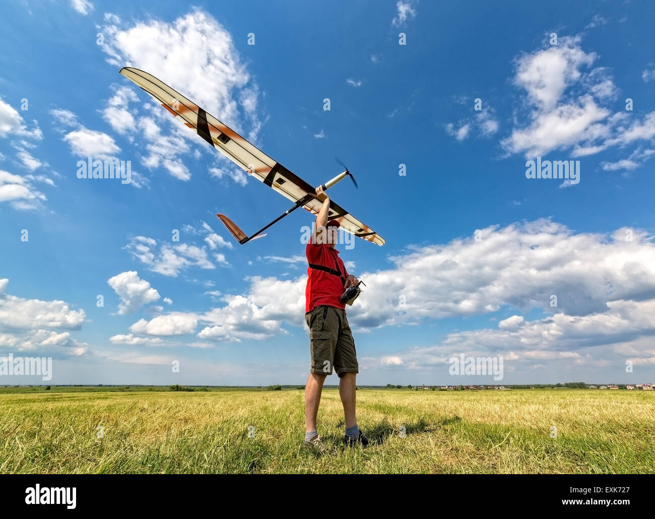 Man Launches into the Sky RC Glider, wide-angle Stock Photo - Alamy