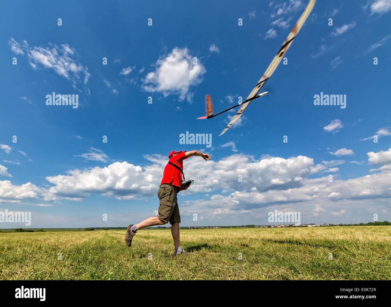 Man Launches into the Sky RC Glider, wide-angle Stock Photo - Alamy